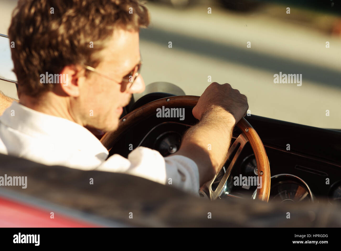 Man driving a convertible car hi-res stock photography and images - Alamy