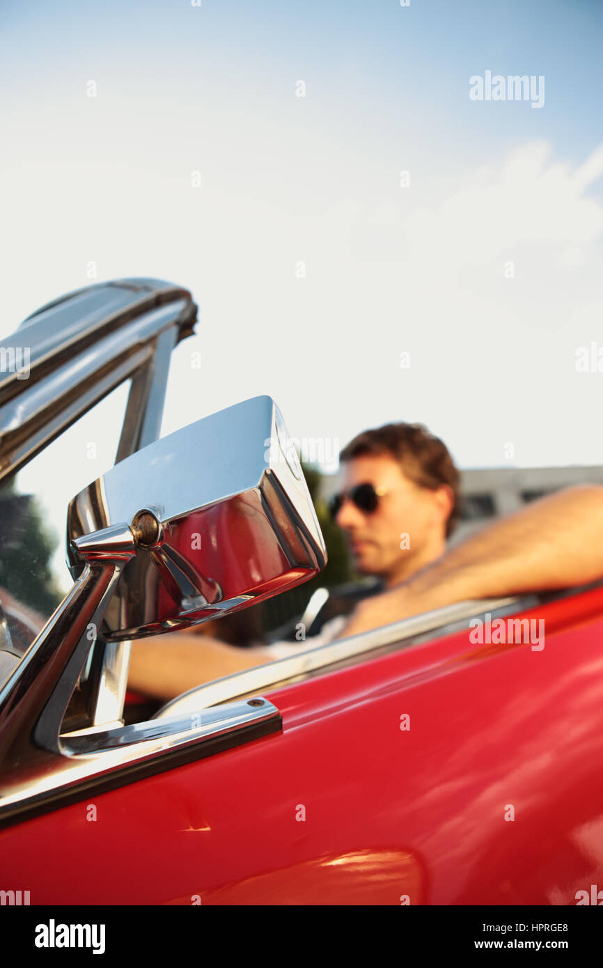 Rear view mirror man sunglasses hi-res stock photography and images - Alamy