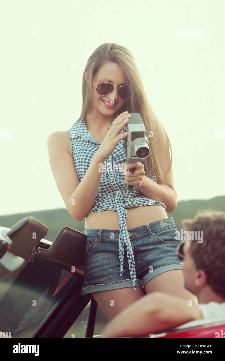 Man filming girl hi-res stock photography and images - Alamy