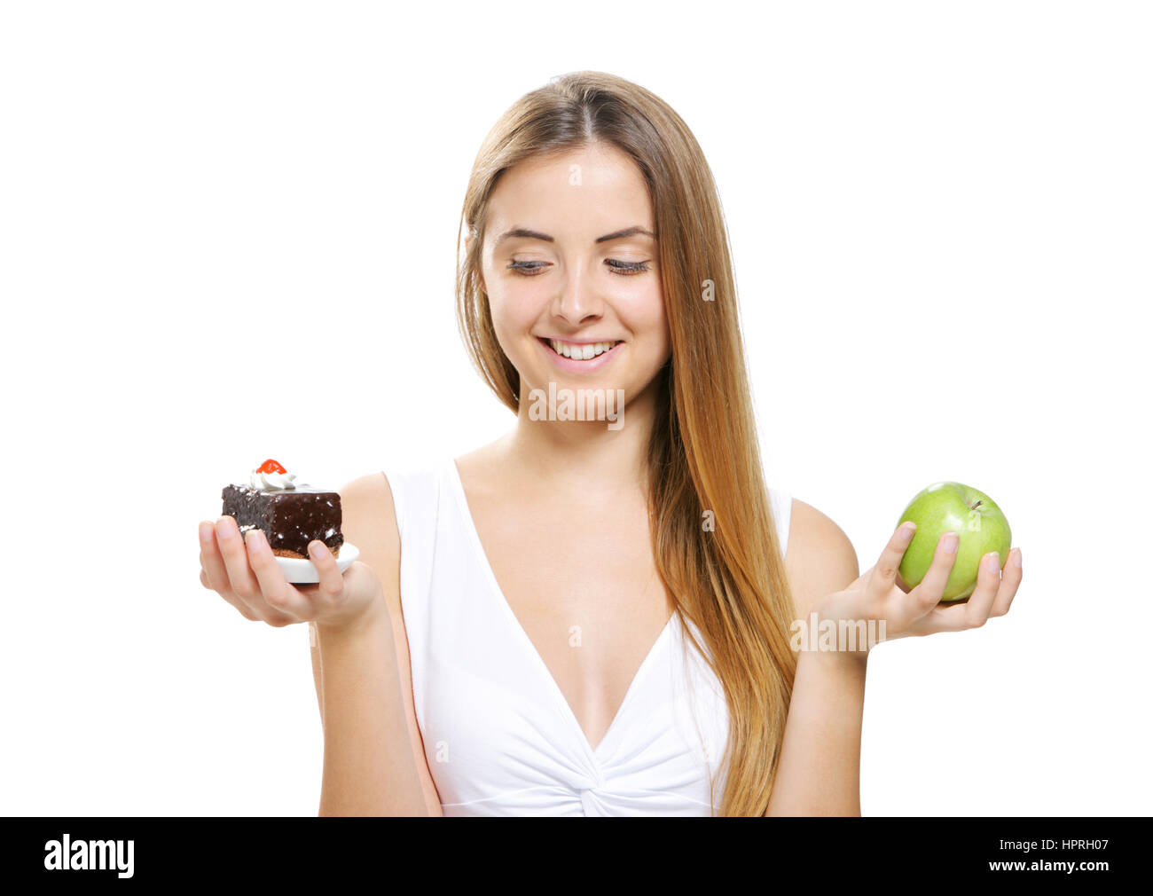 diet concept: Woman choosing between fruits and cakes Stock Photo - Alamy diet concept: Woman choosing between fruits and cakes Stock Photo - Alamy