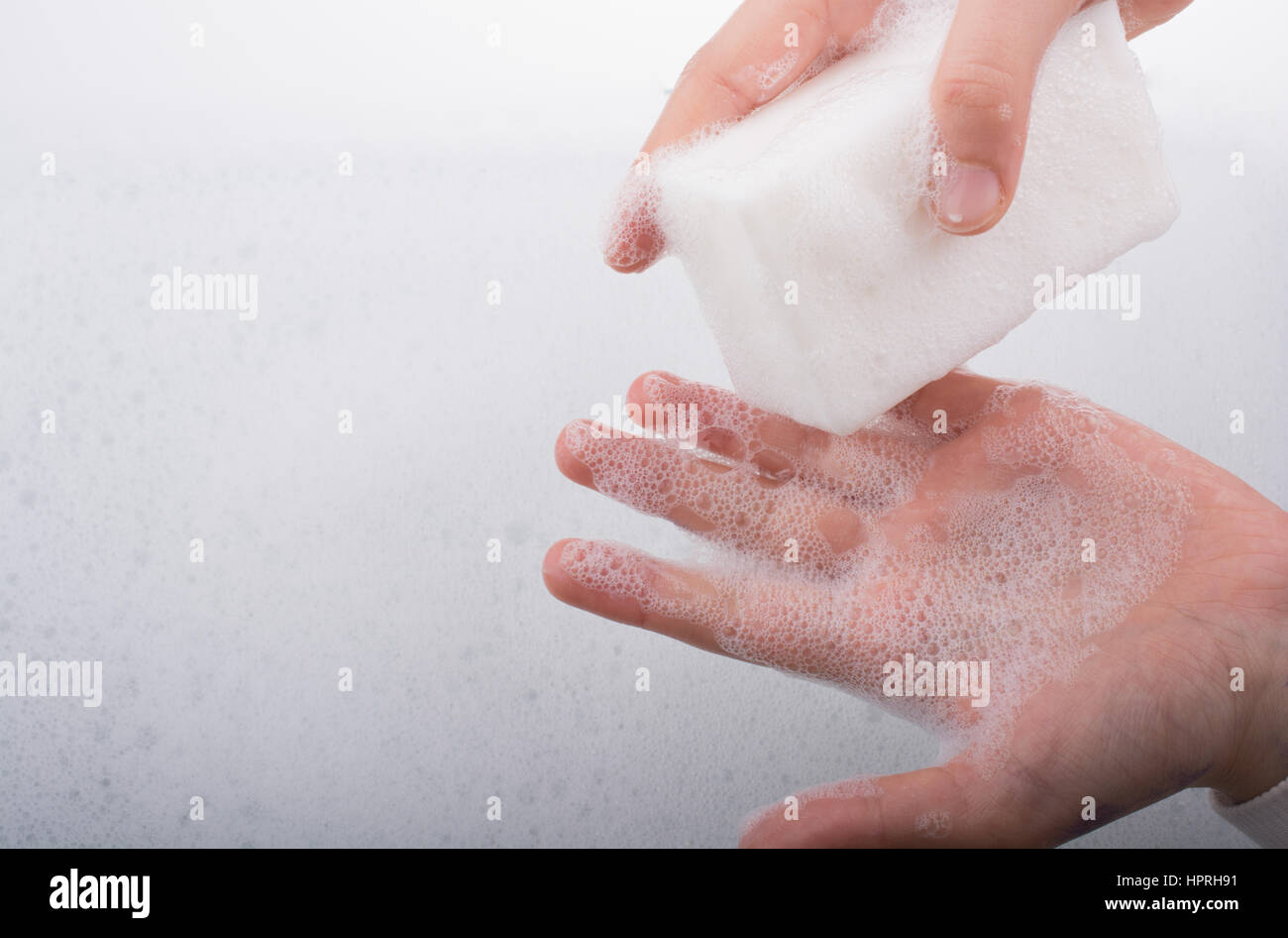 Hand washing and soap foam on a foamy background Stock Photo - Alamy