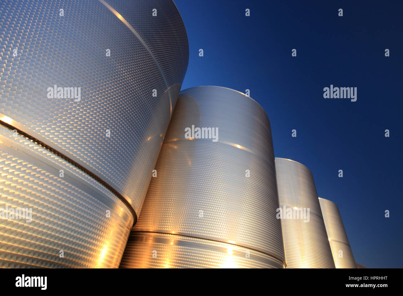 Industrial silos container. Circular shape Stock Photo - Alamy