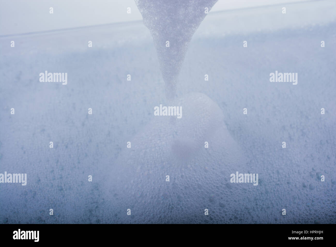 Pure water covered with foam of shampoo Stock Photo - Alamy