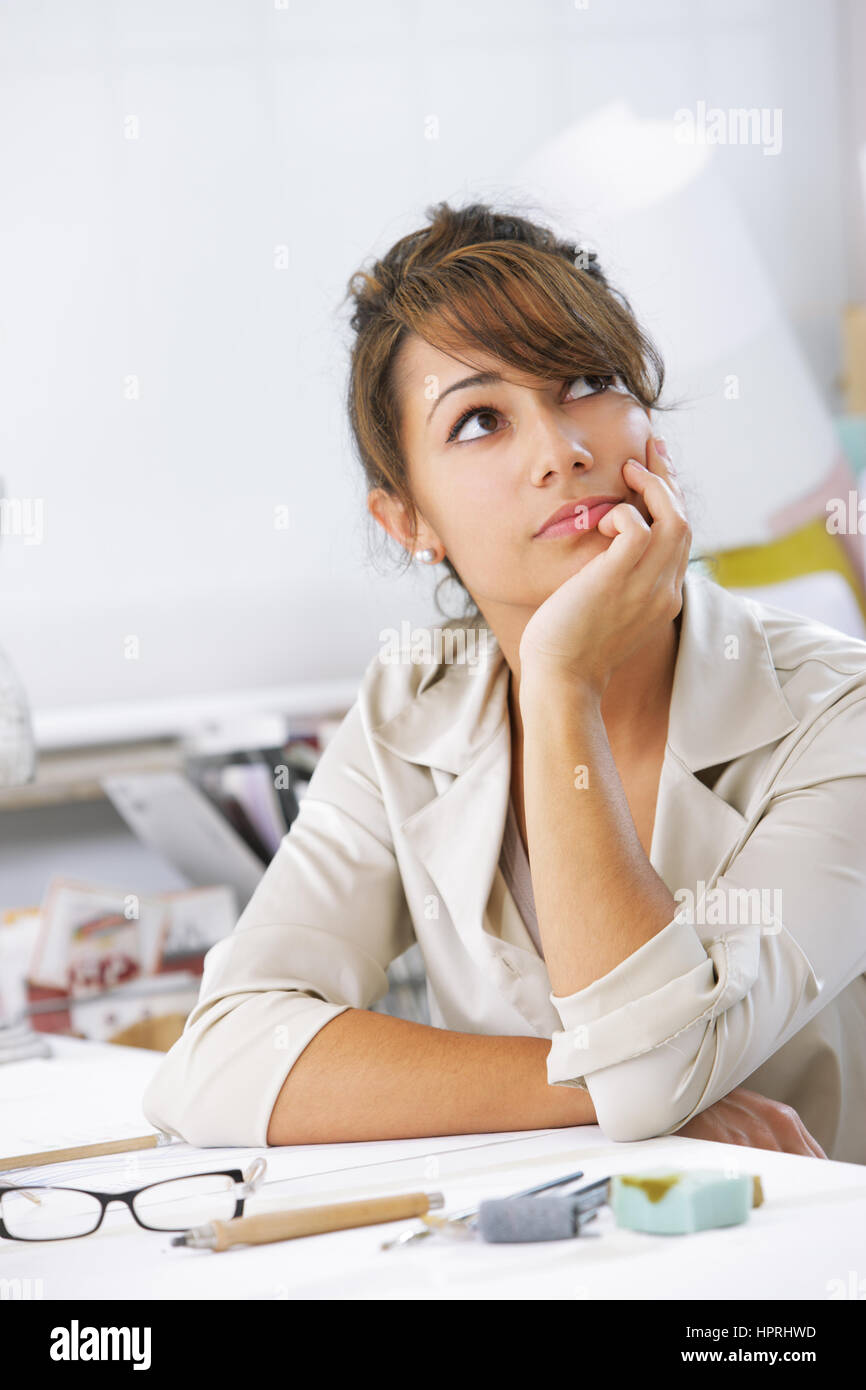 Portrait of attractive female designer Stock Photo - Alamy