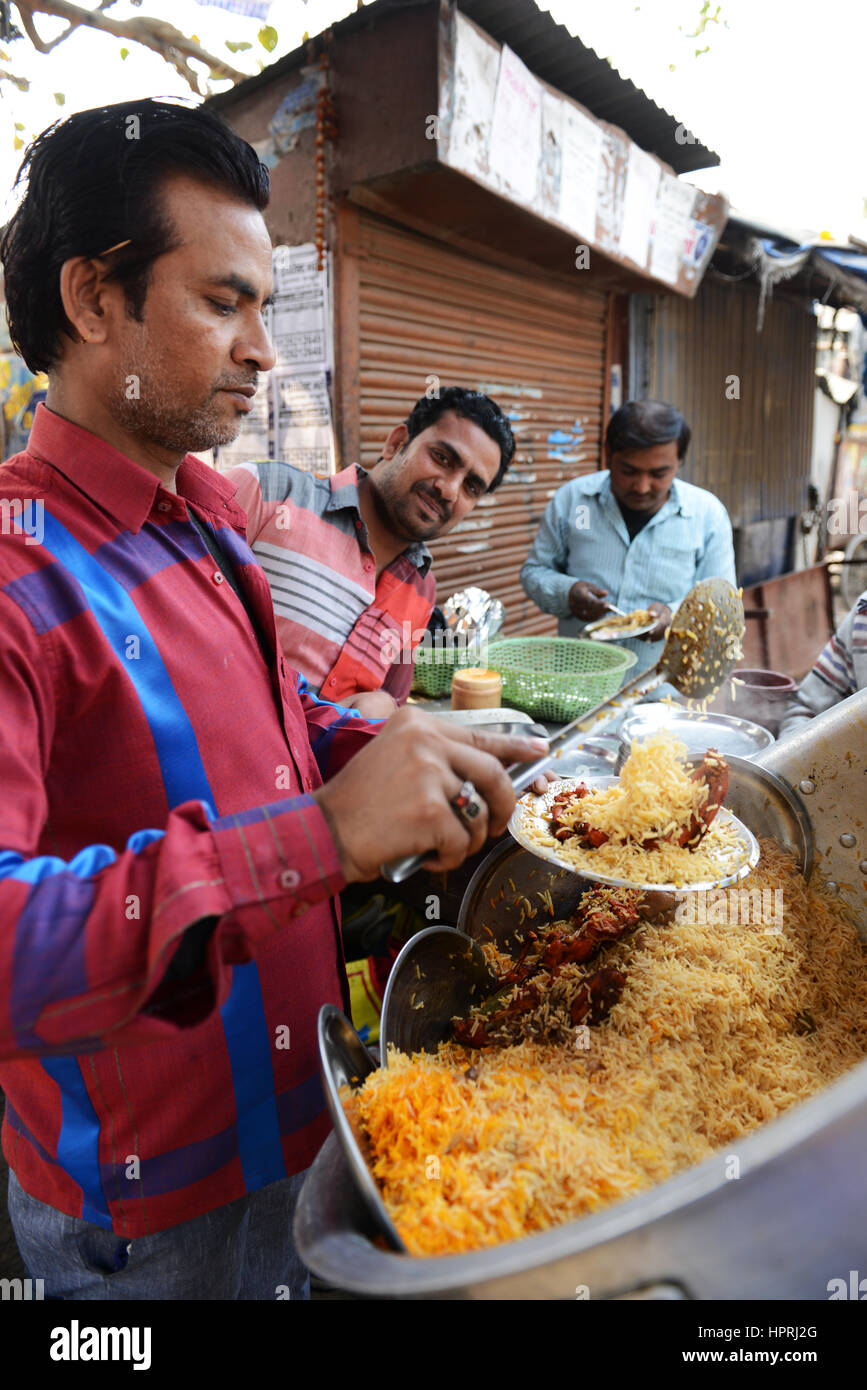 A Biryani vendor serving Chicken Biryani from his pot in Kannauj, Uttar ...