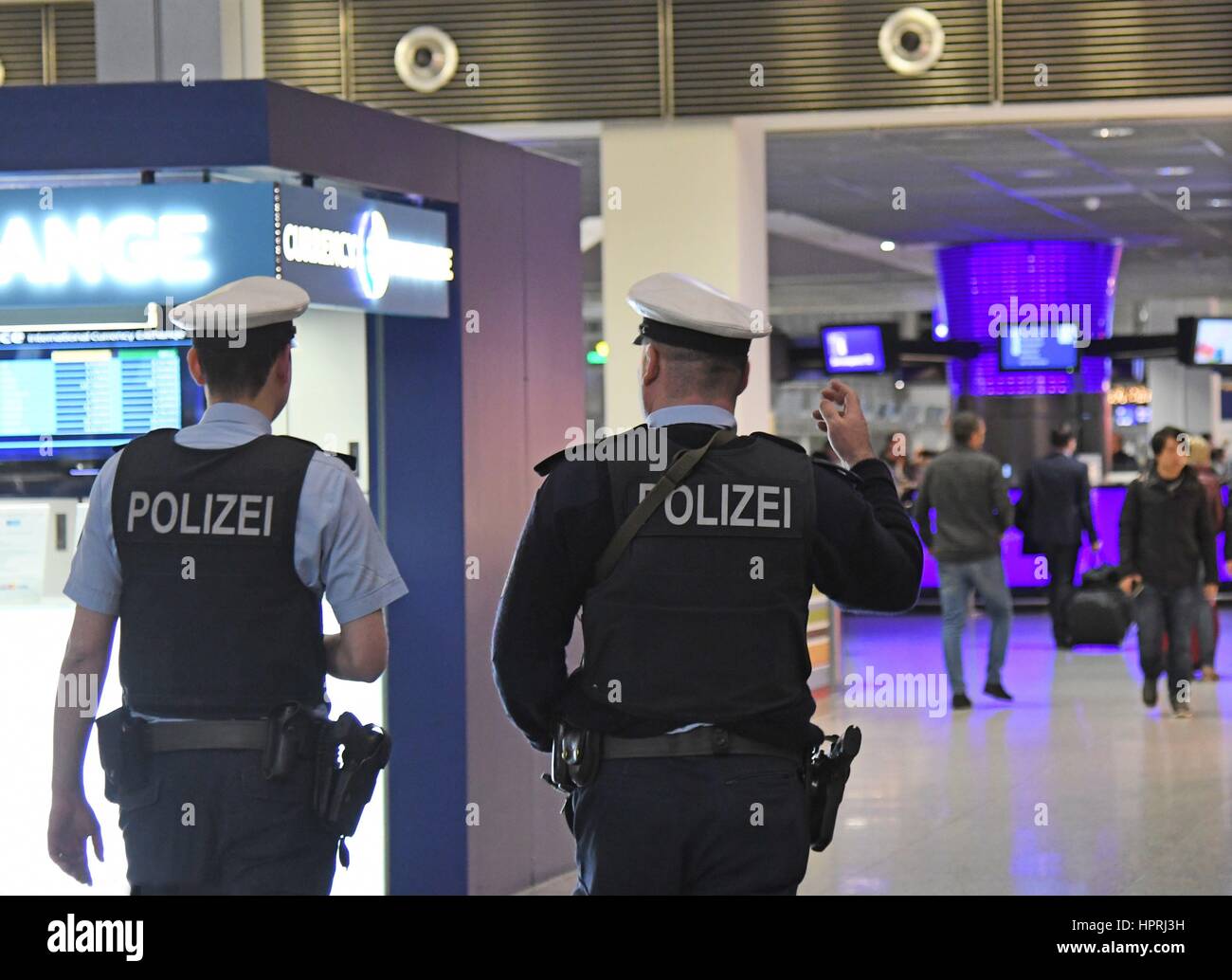 German police officers patrol in the Airport Frankfurt, Dec.15, 2016 ...