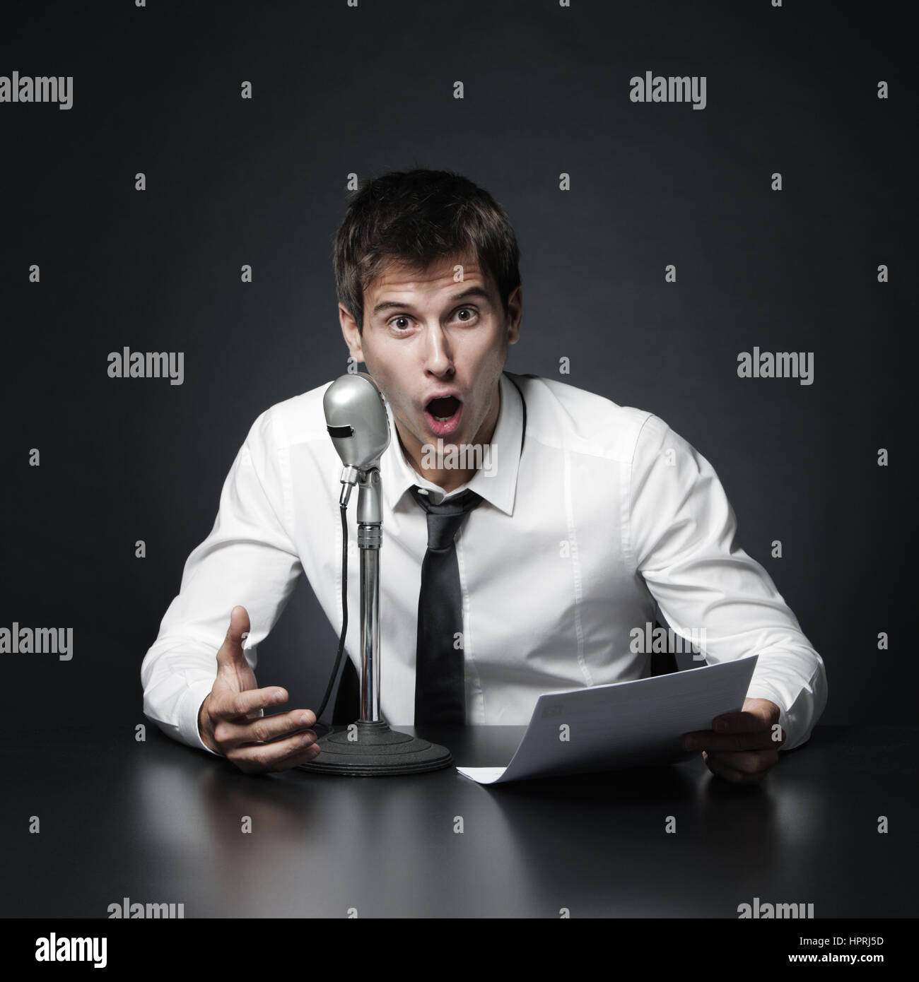 Anchorman screams news Stock Photo - Alamy