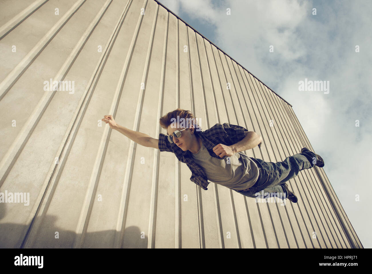 Man flying like superman hi-res stock photography and images - Alamy