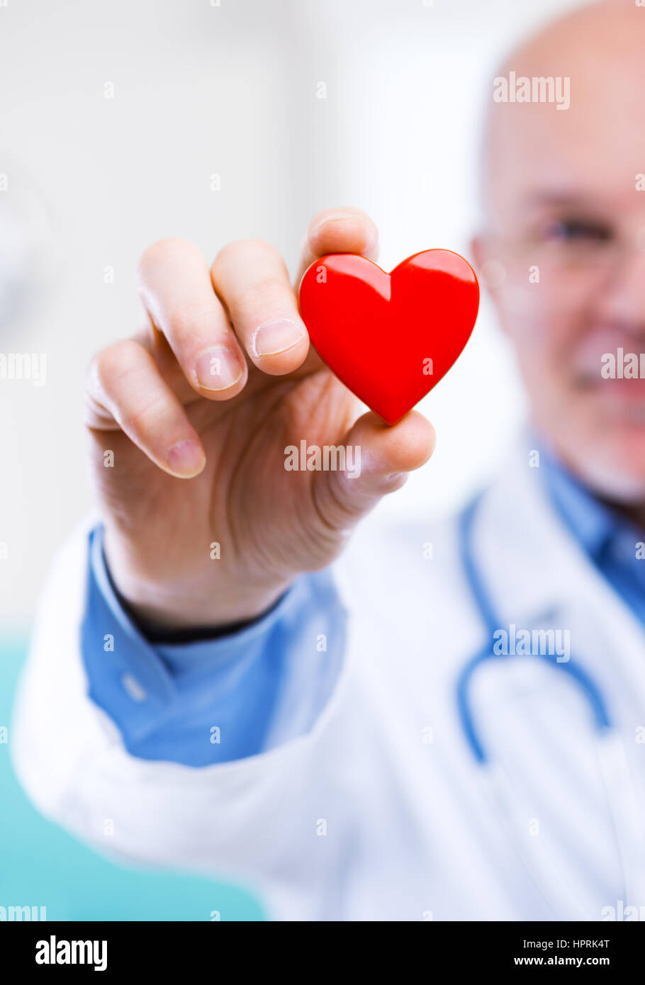 Doctor Holding An Heart Cardiologist And Cardiovascular Diseases