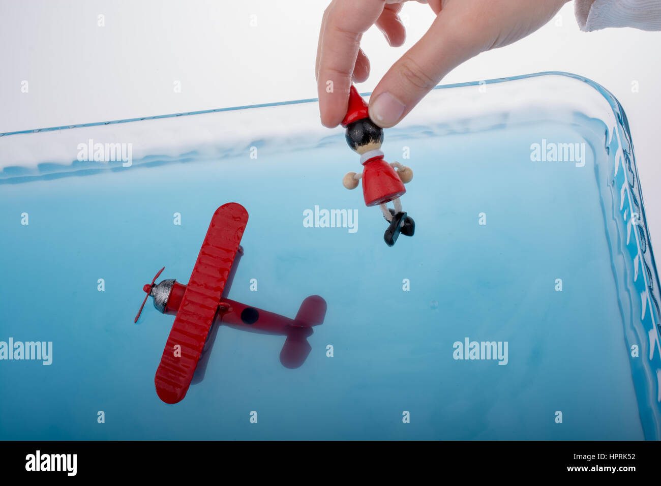 Pinocchio and a model airplane in water Stock Photo - Alamy