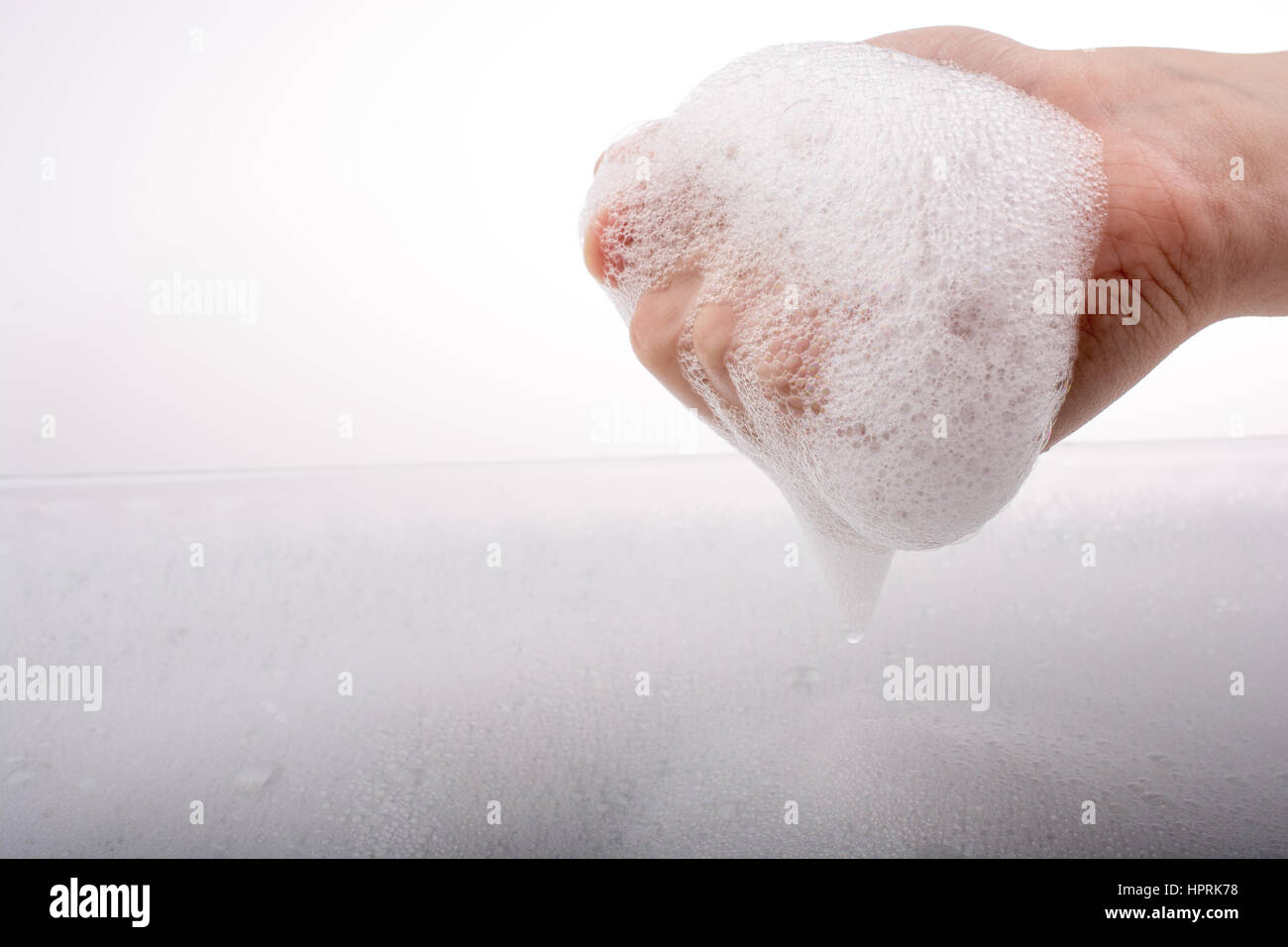 Hand washing and soap foam on a foamy background Stock Photo - Alamy