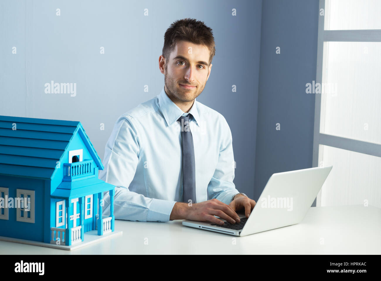Businessman working model house hi-res stock photography and images - Alamy