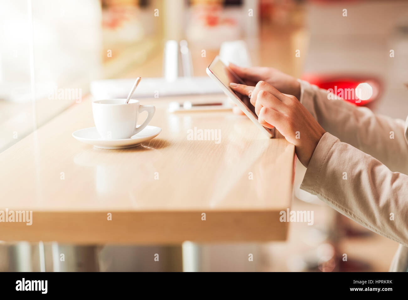 Woman using a touch screen tablet hands close up Stock Photo - Alamy