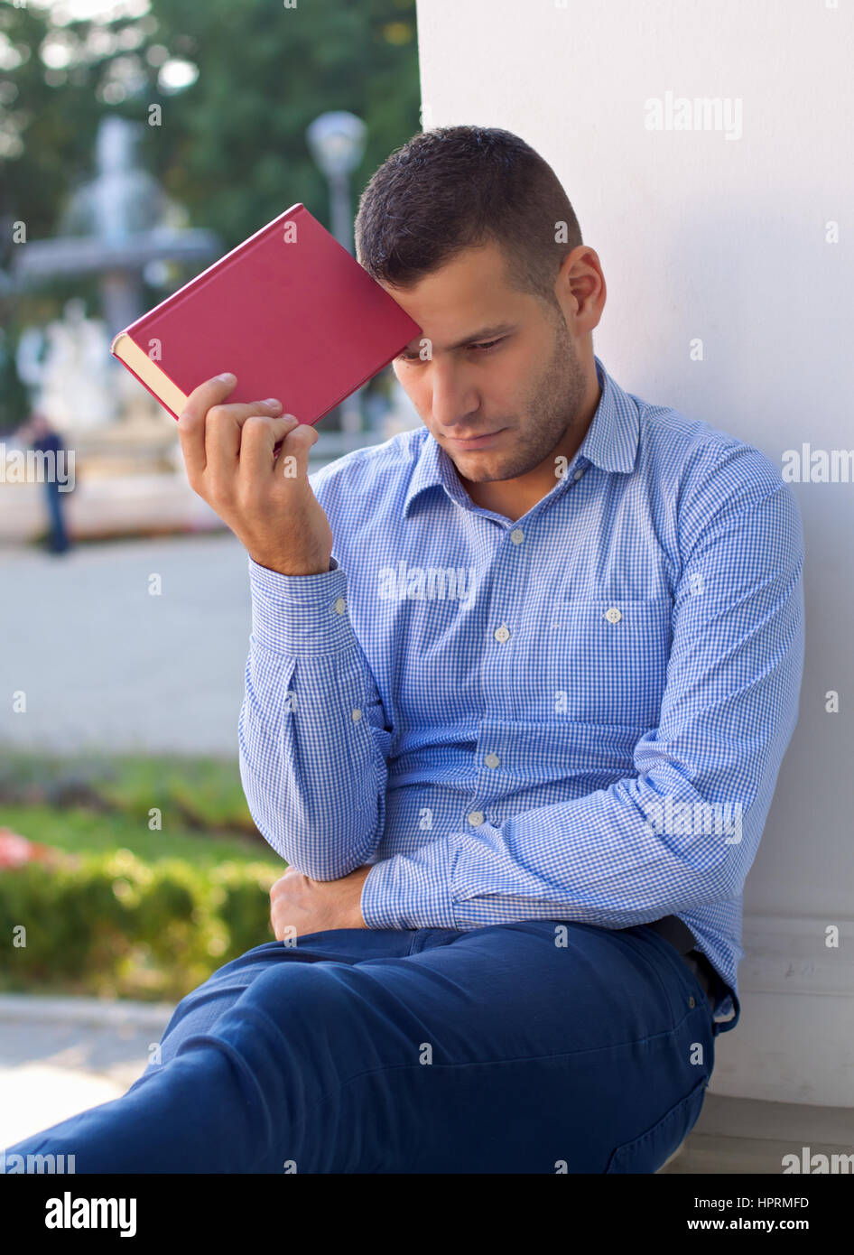 Picture Of A Handsome Man Reading An Interesting Book Stock Photo Alamy picture-of-a-handsome-man-reading-an-interesting-book-stock-photo-alamy