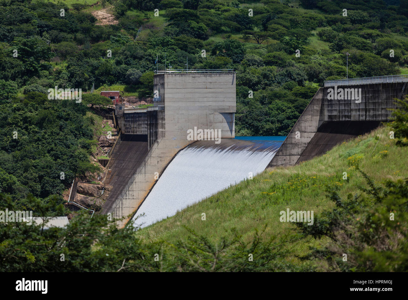 Inanda Dam fill to capacity and water flowing over the high wall Stock ...