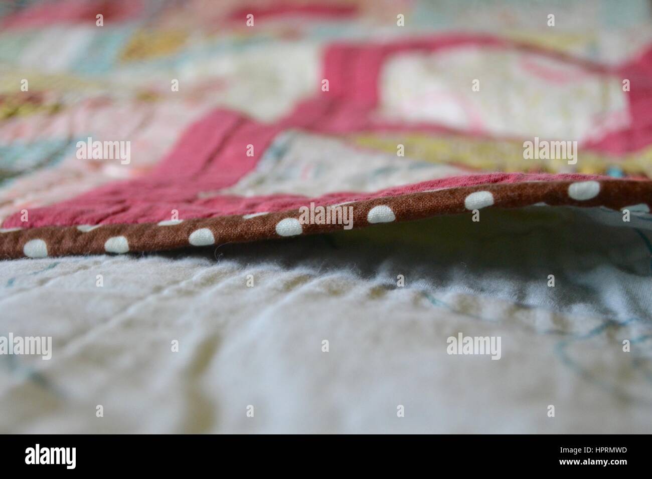 Homemade craftwork hand sewn quilt with intricate stitching Stock Photo ...