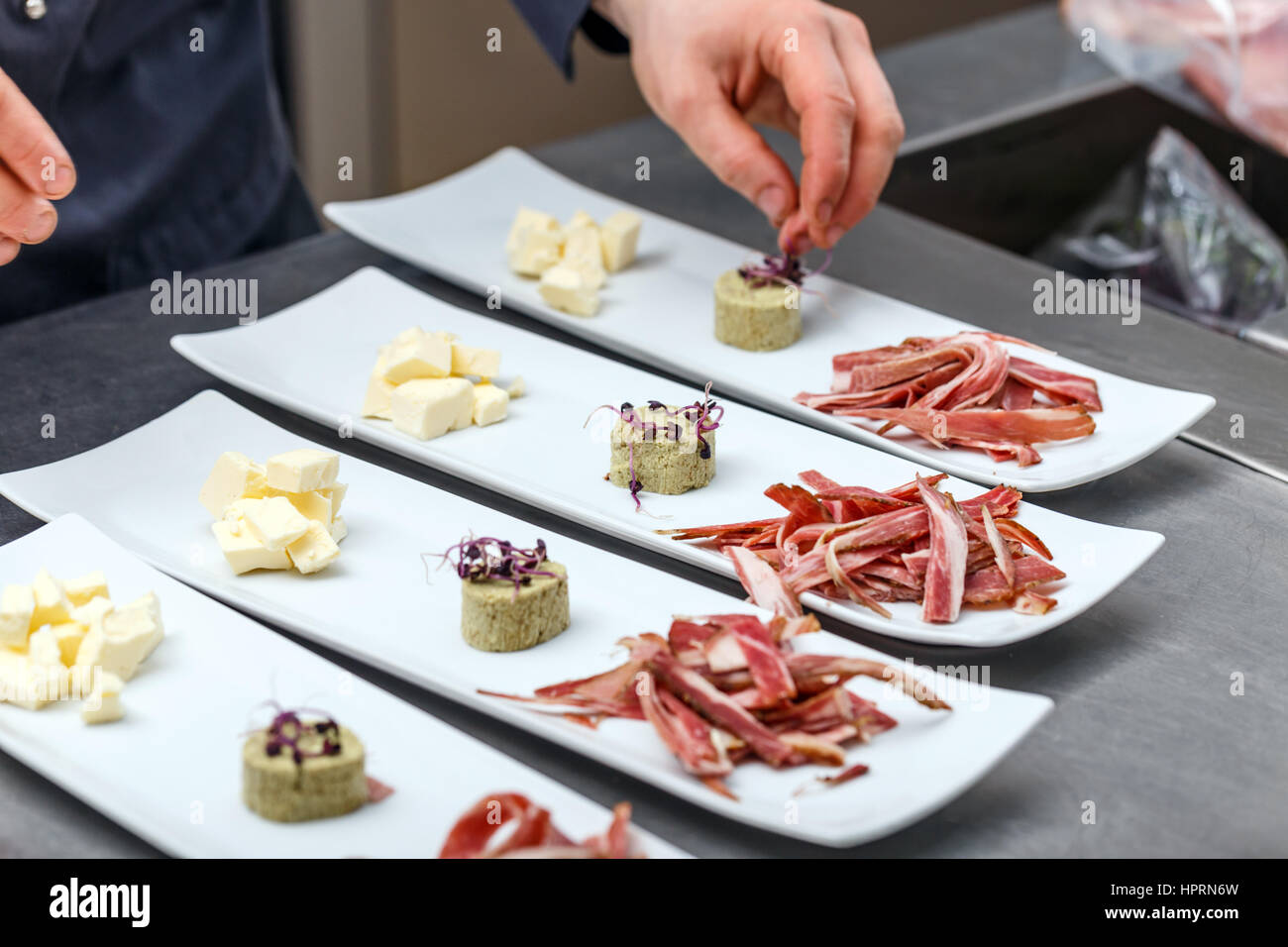 Preparing appetizer hi-res stock photography and images - Alamy