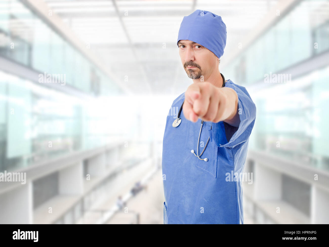 male doctor pointing at the hospital Stock Photo - Alamy