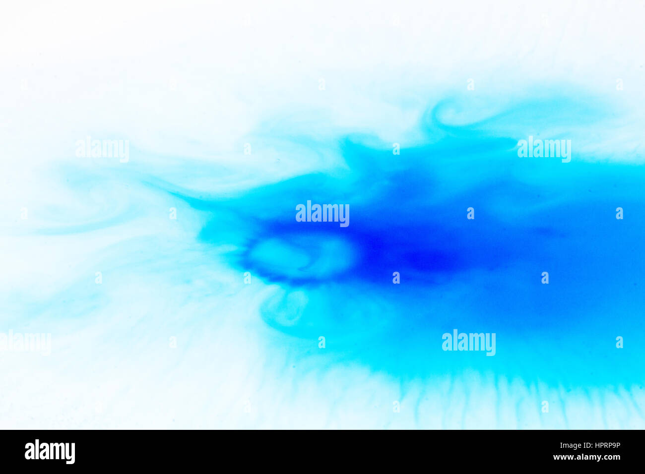 Colorful paint drop splashing on black a background Stock Photo - Alamy