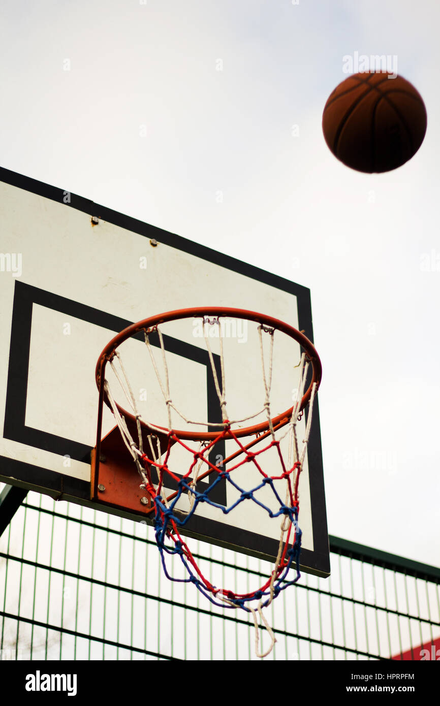 Basketball hoop outside in a school play area Stock Photo - Alamy