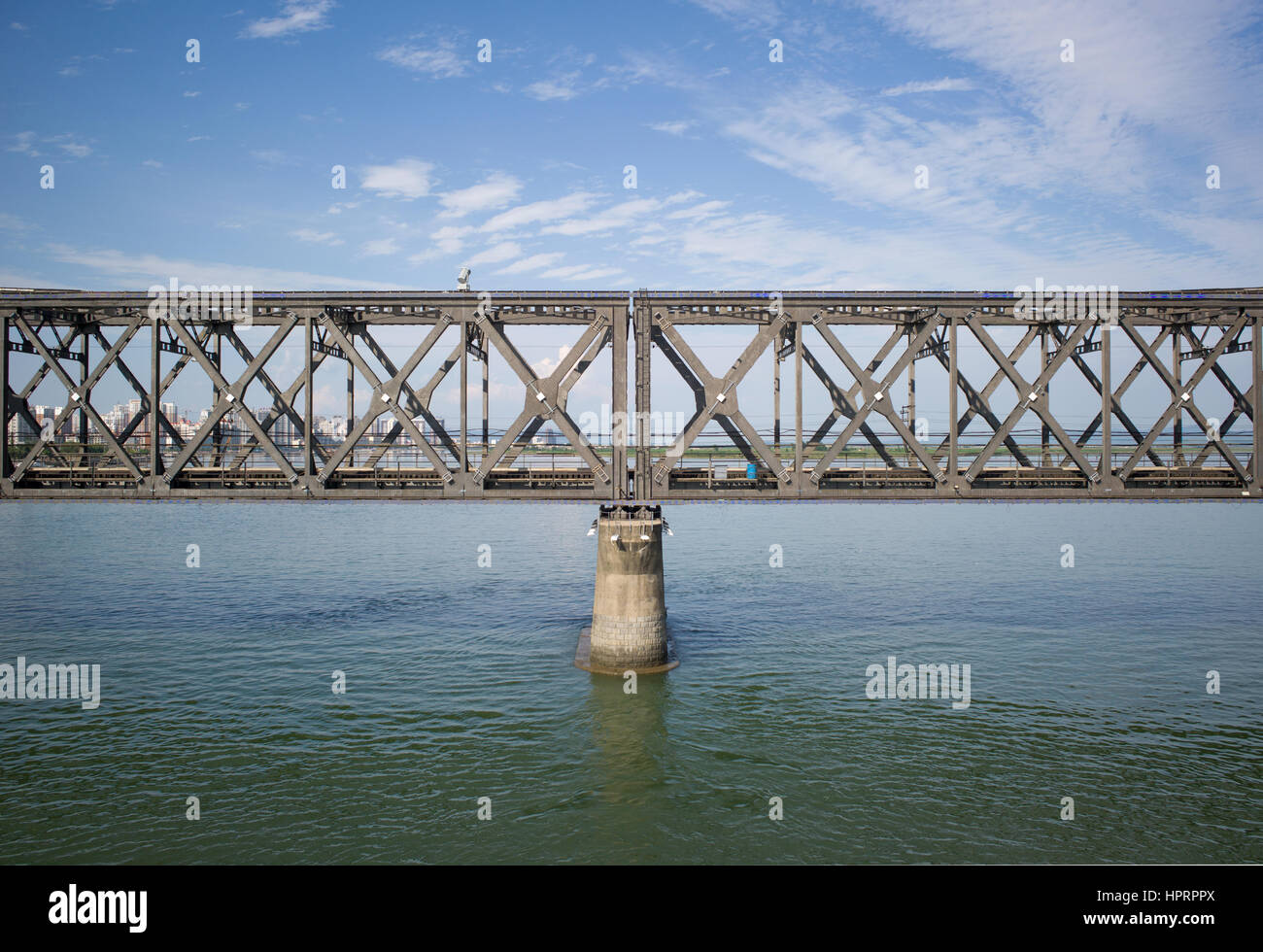 Riveted steel girder sino-korean friendship bridge over Yalu River ...