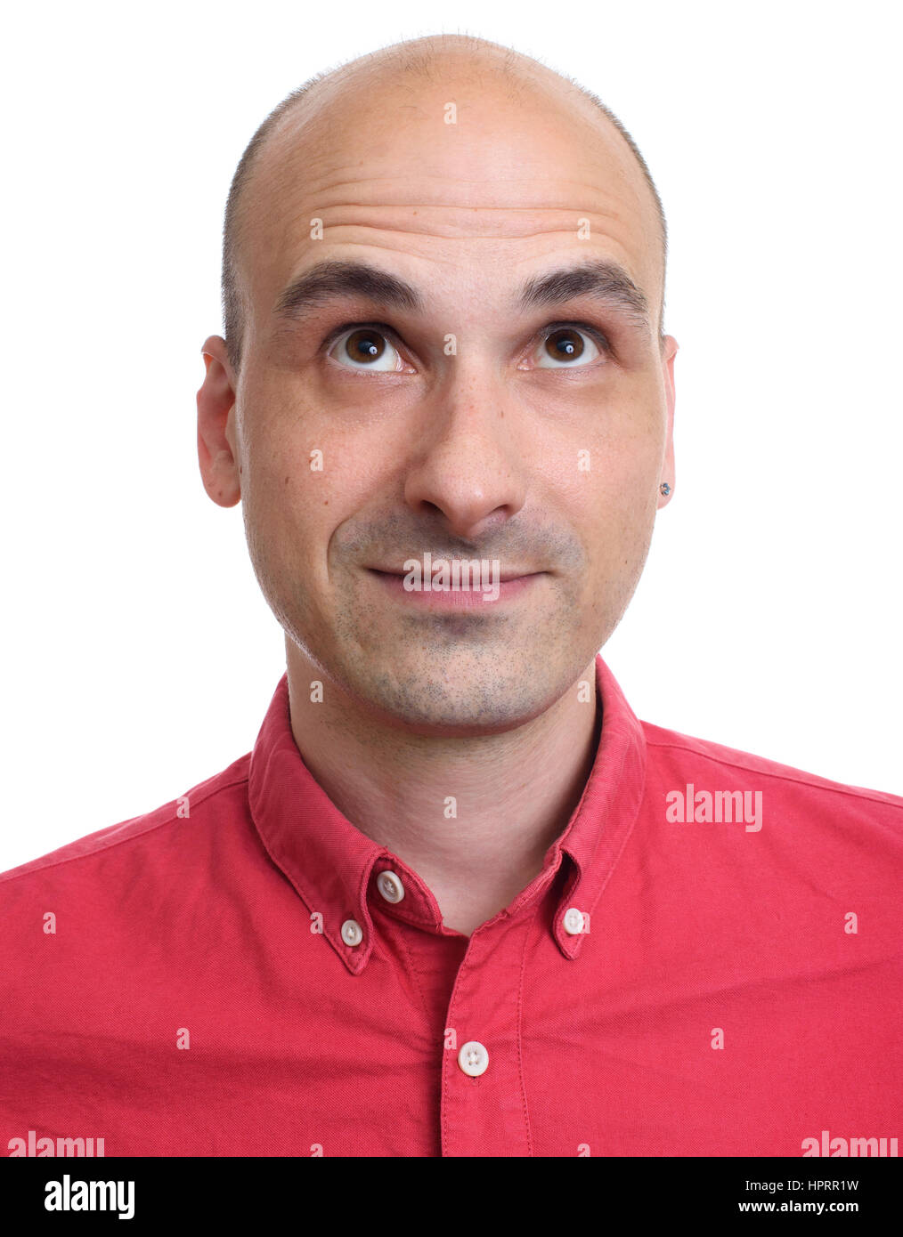 Bald man looking up isolated on a white background Stock Photo - Alamy