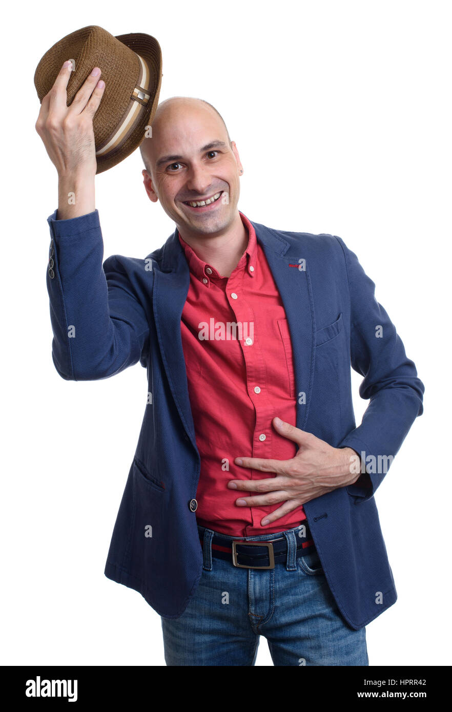 Fashionable Handsome man takes off his hat. Isolated on white ...