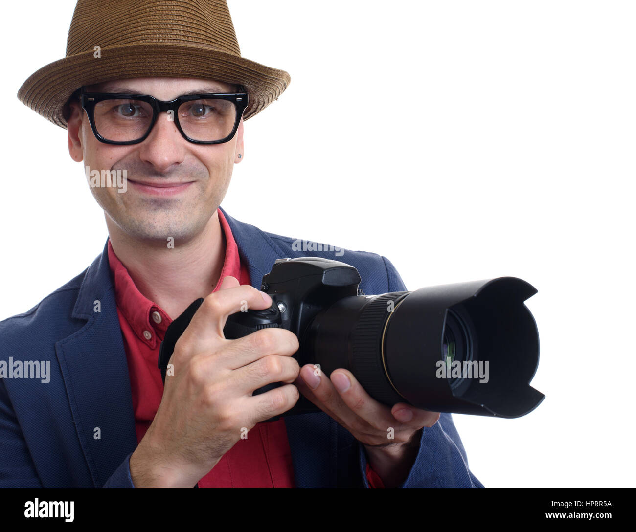 portrait of handsome photographer holding a camera. Isolated Stock ...