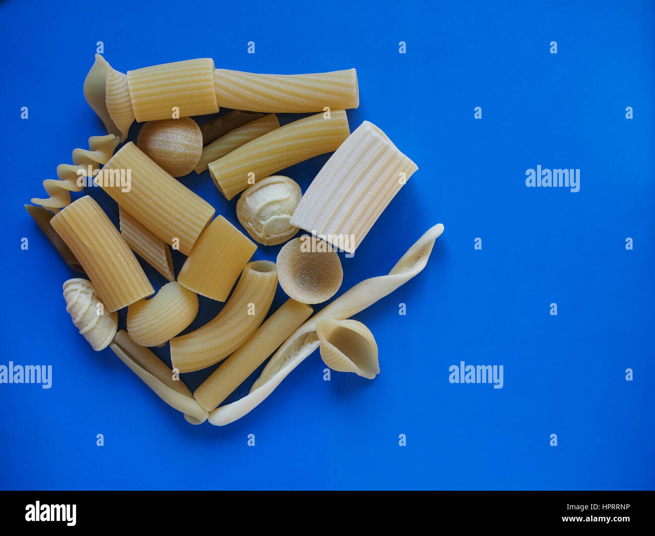 Many different types of Italian pasta including penne macaroni ...