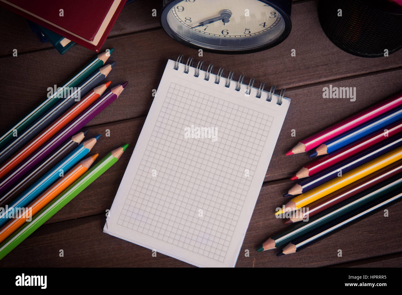 office and student gear over wood background - Back to school concept ...