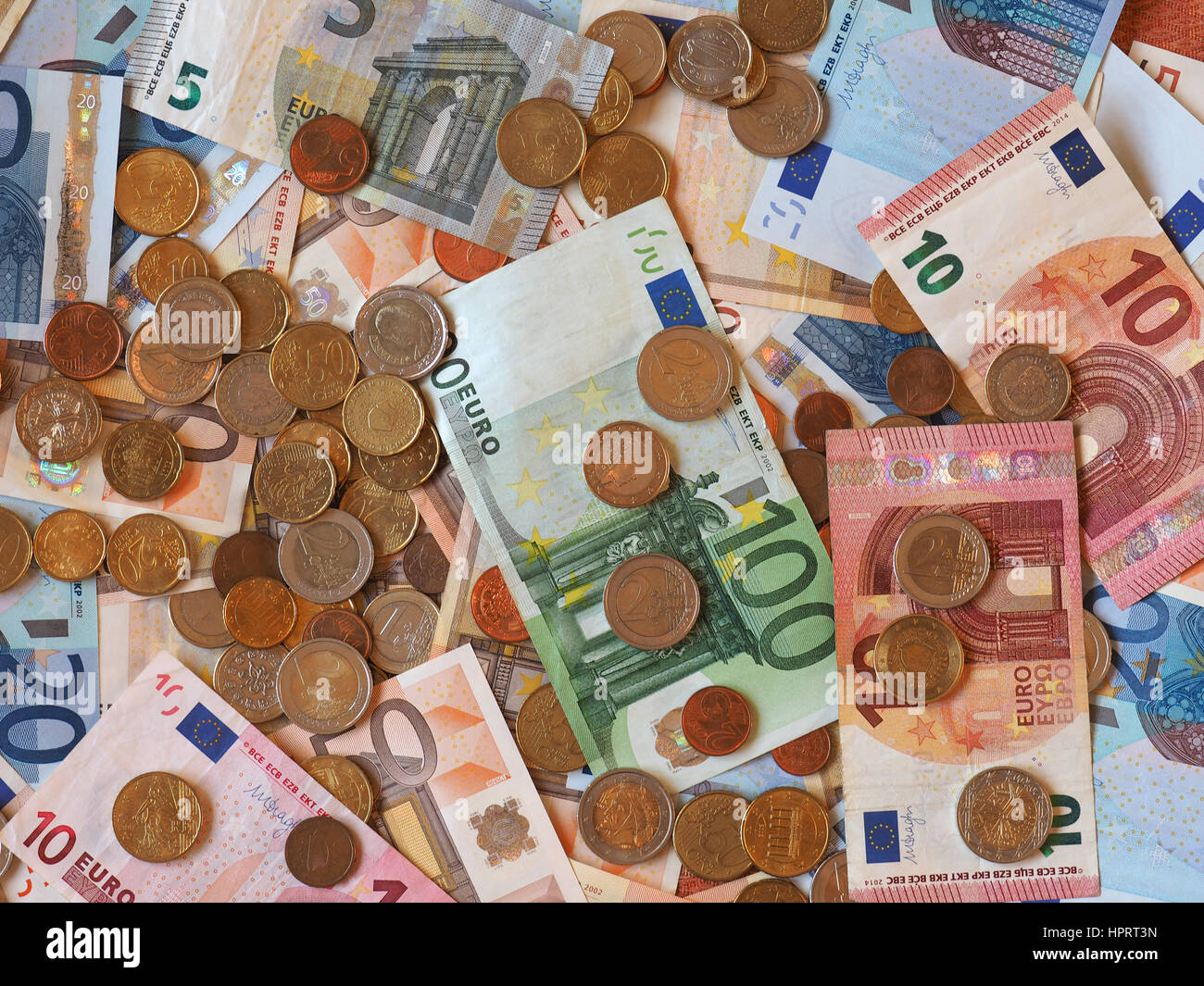 Euro (EUR) banknotes and coins, currency of European Union (EU Stock ...