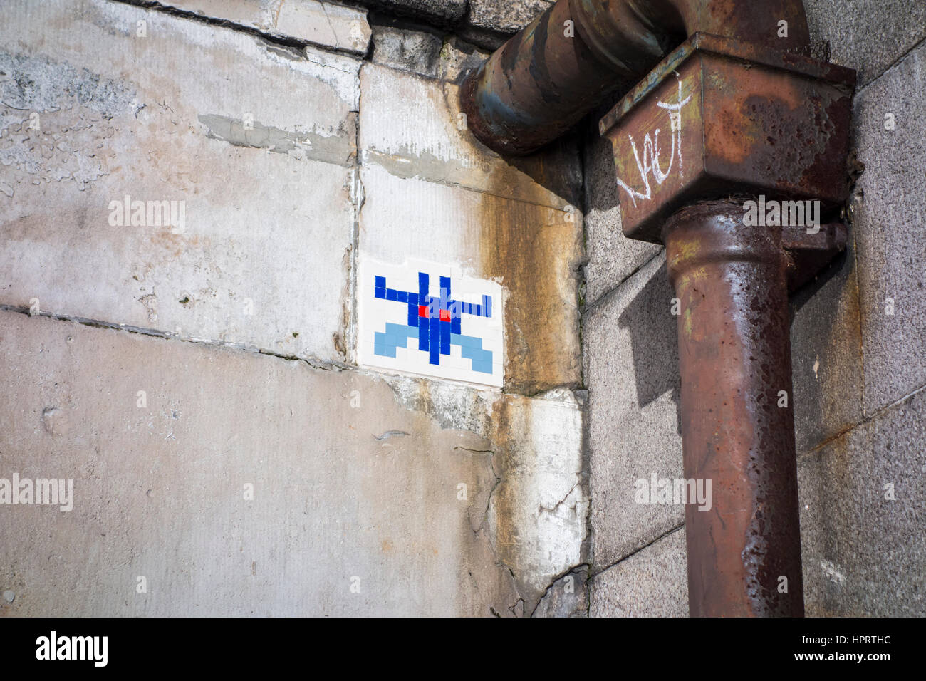 Graffiti by French urban artist Invader on Westminster Bridge, London ...