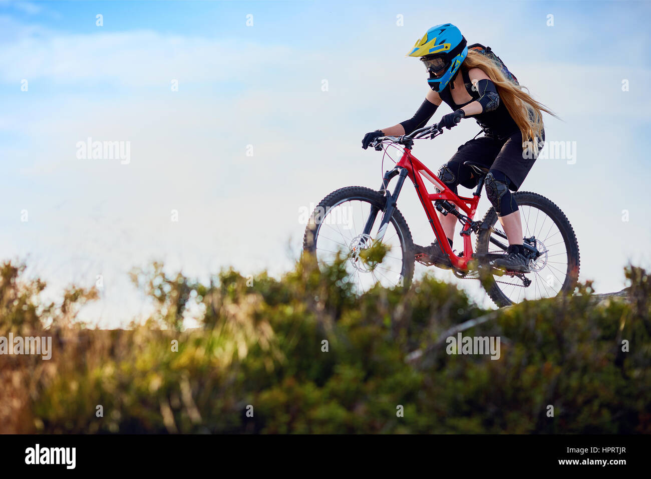 Female cross country biker cycling hi-res stock photography and images ...