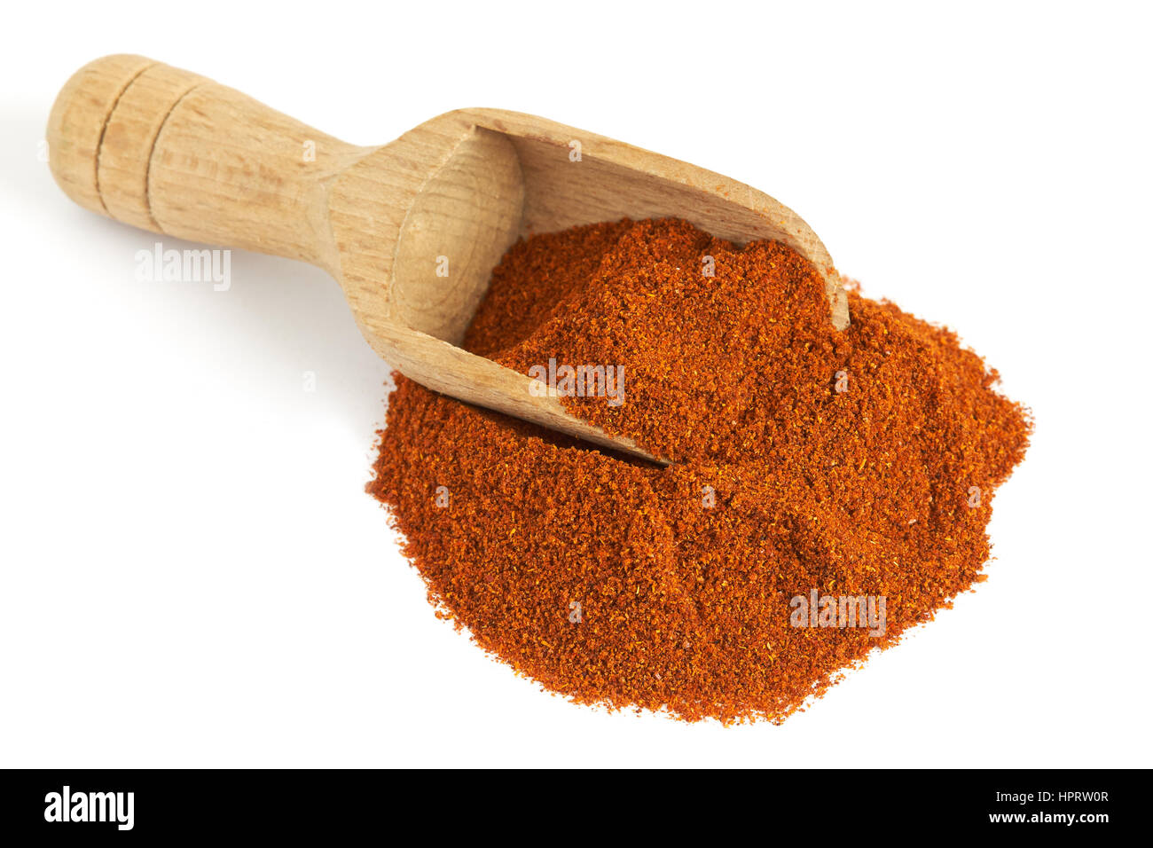 Red paprika powder with wooden scoop isolated on white background Stock ...