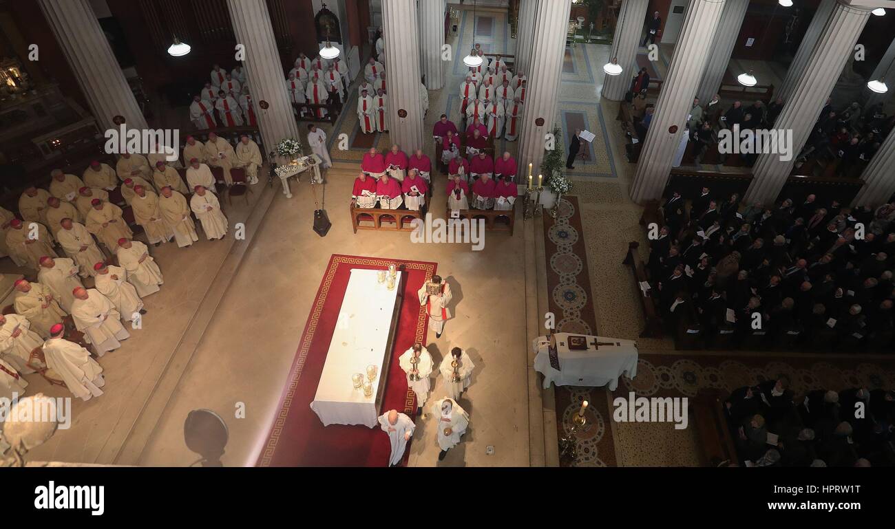 Members of the clergy and the public attend the funeral mass of late ...