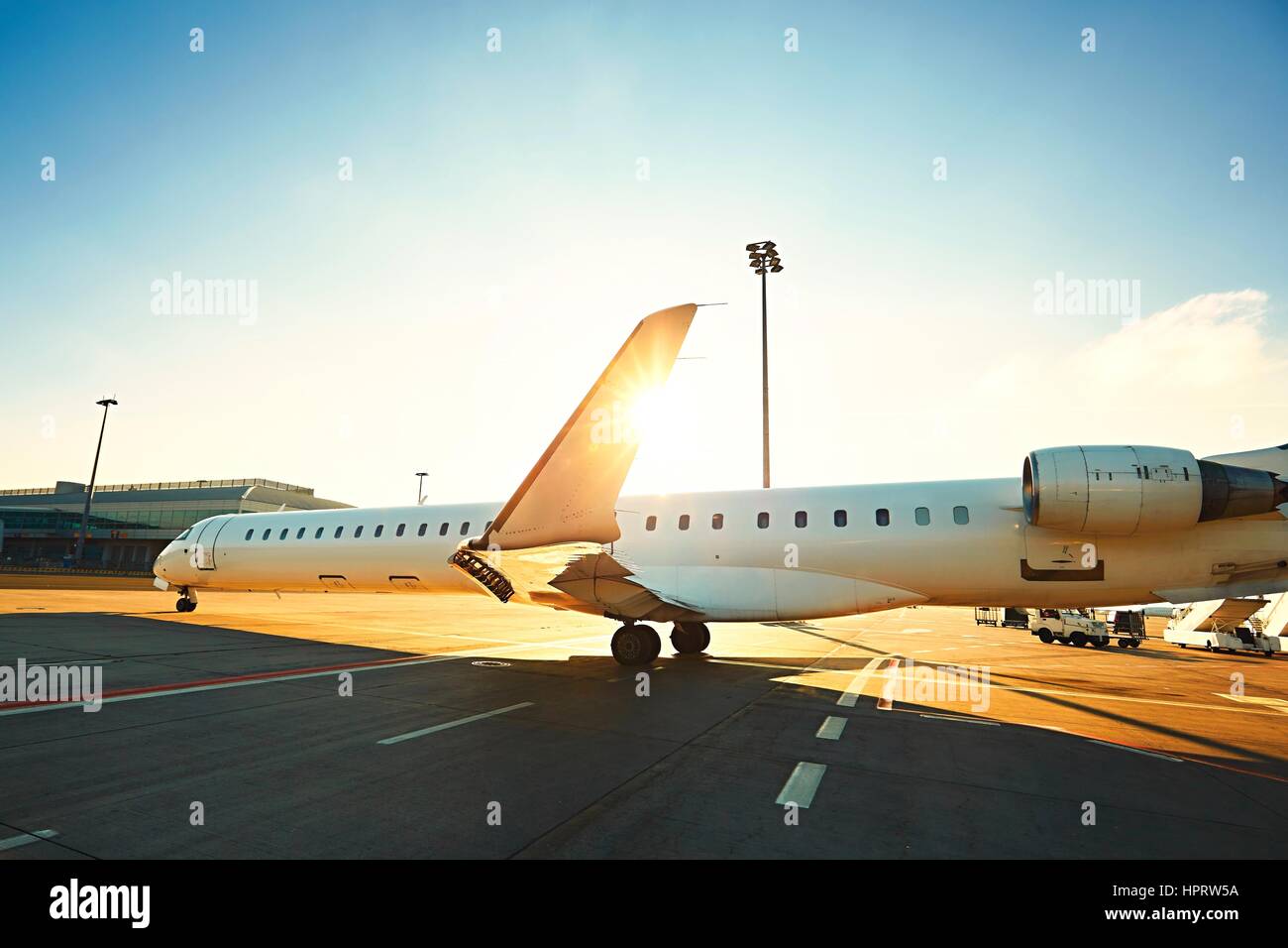 Daily life at the international airport. The airplane is taxiing to the ...
