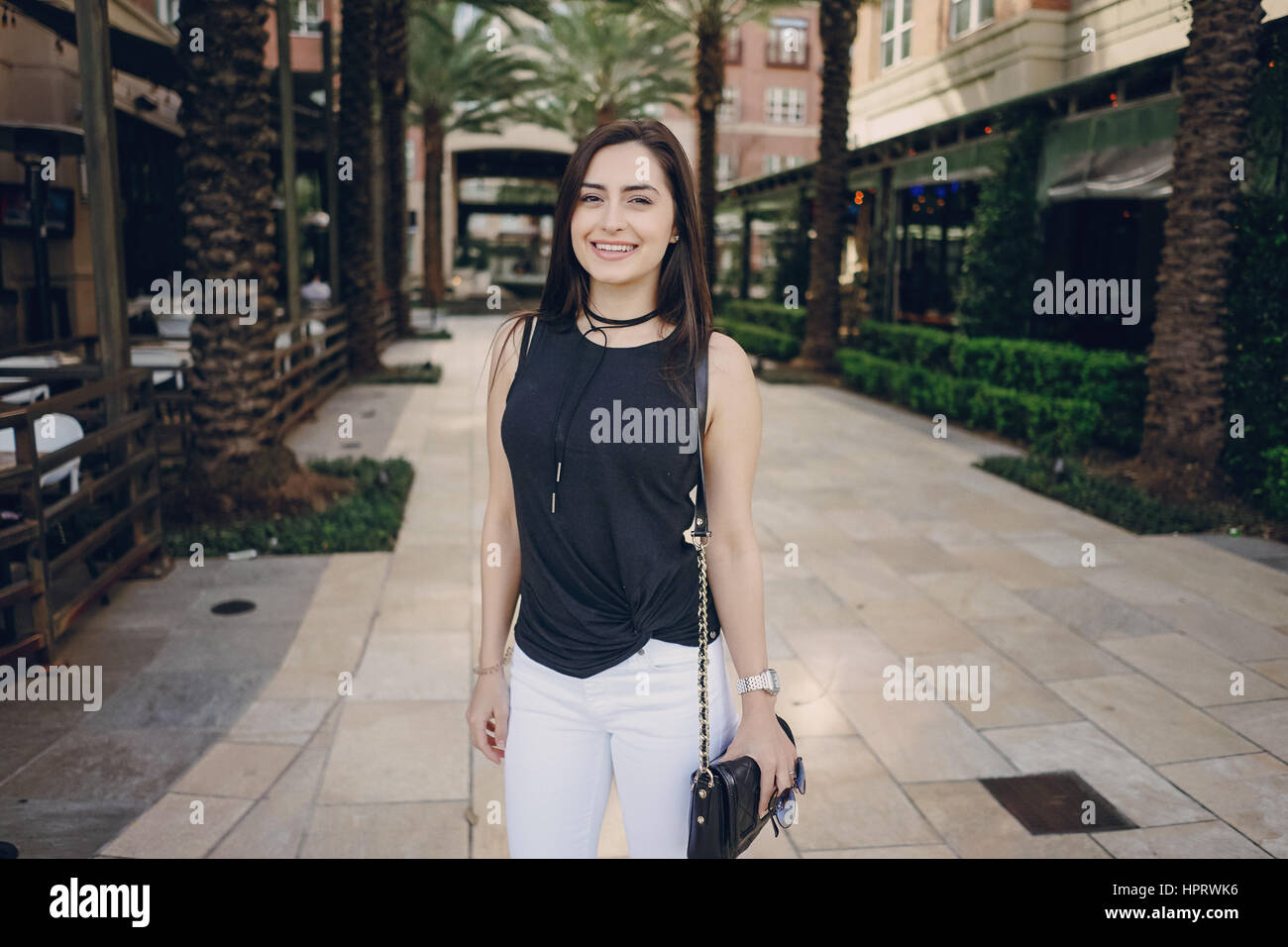 beautiful young girl enjoying the warm weather Stock Photo - Alamy