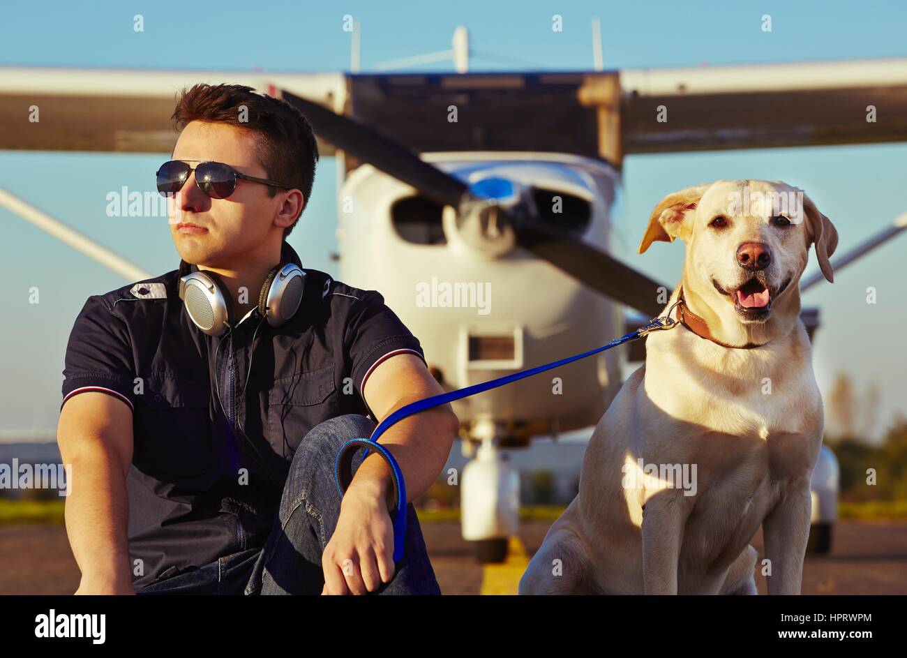 Handsome young pilot sitting private hi-res stock photography and ...