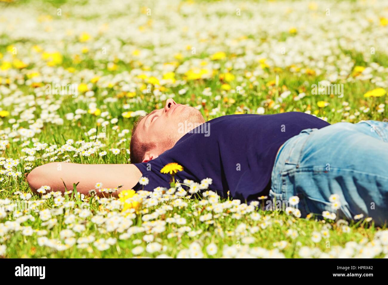 Happy young guy enjoying sunlight hi-res stock photography and images ...