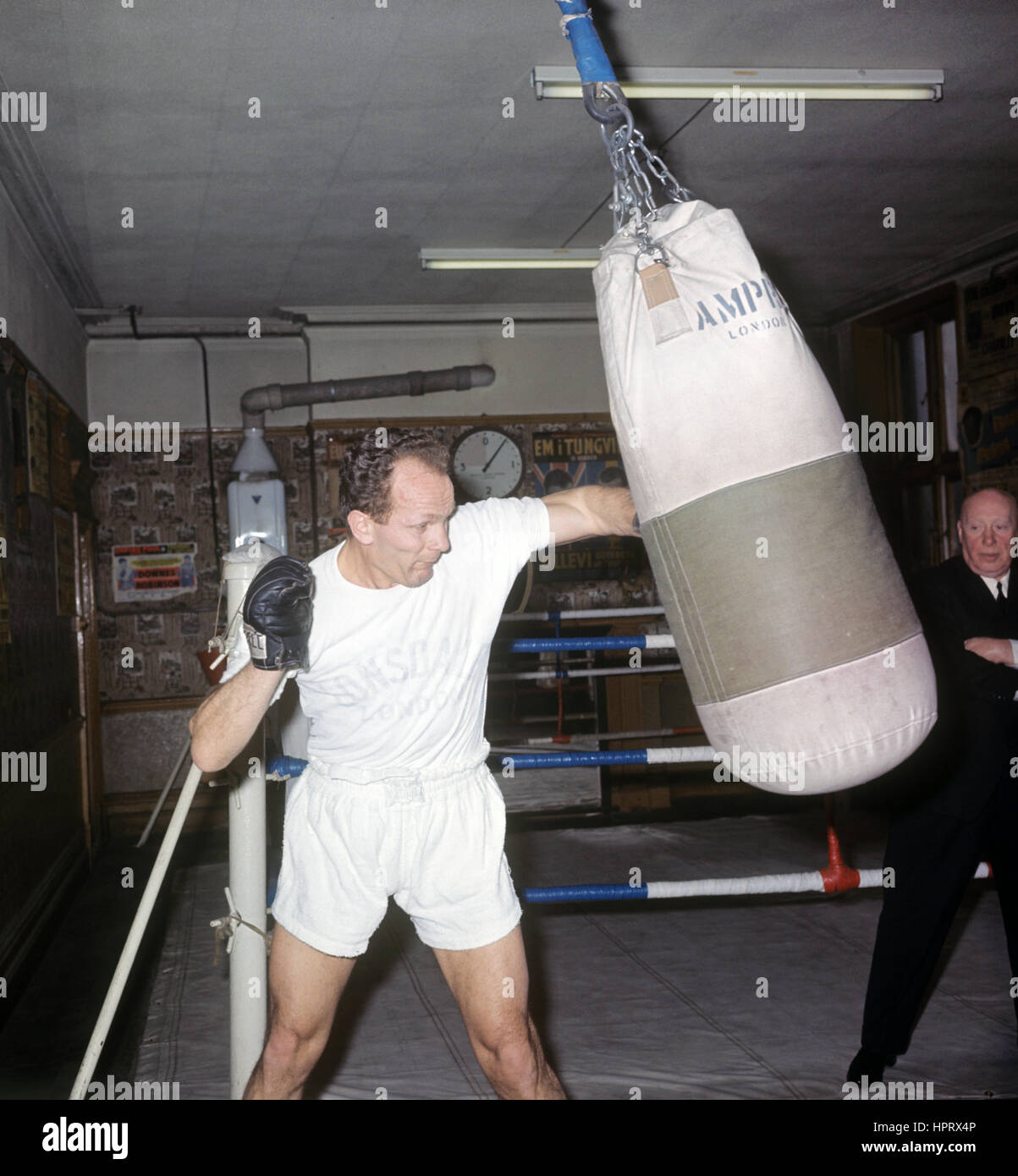 British heavyweight Henry Cooper training at Thomas A Becket Gymnasium ...