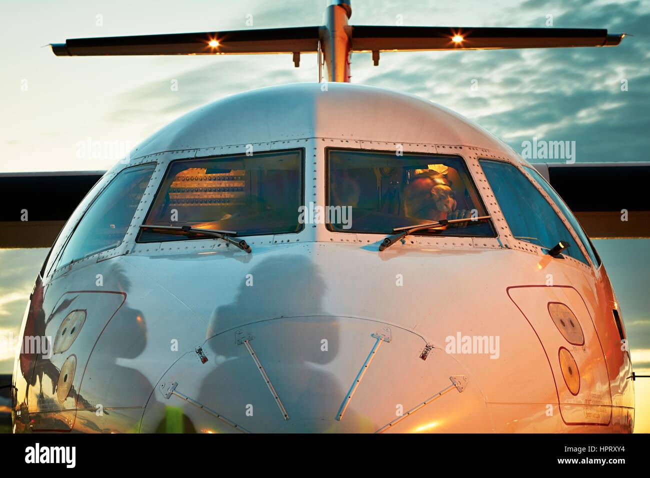 Preparation before take off - Cockpit of the airplane and shadow of the ...