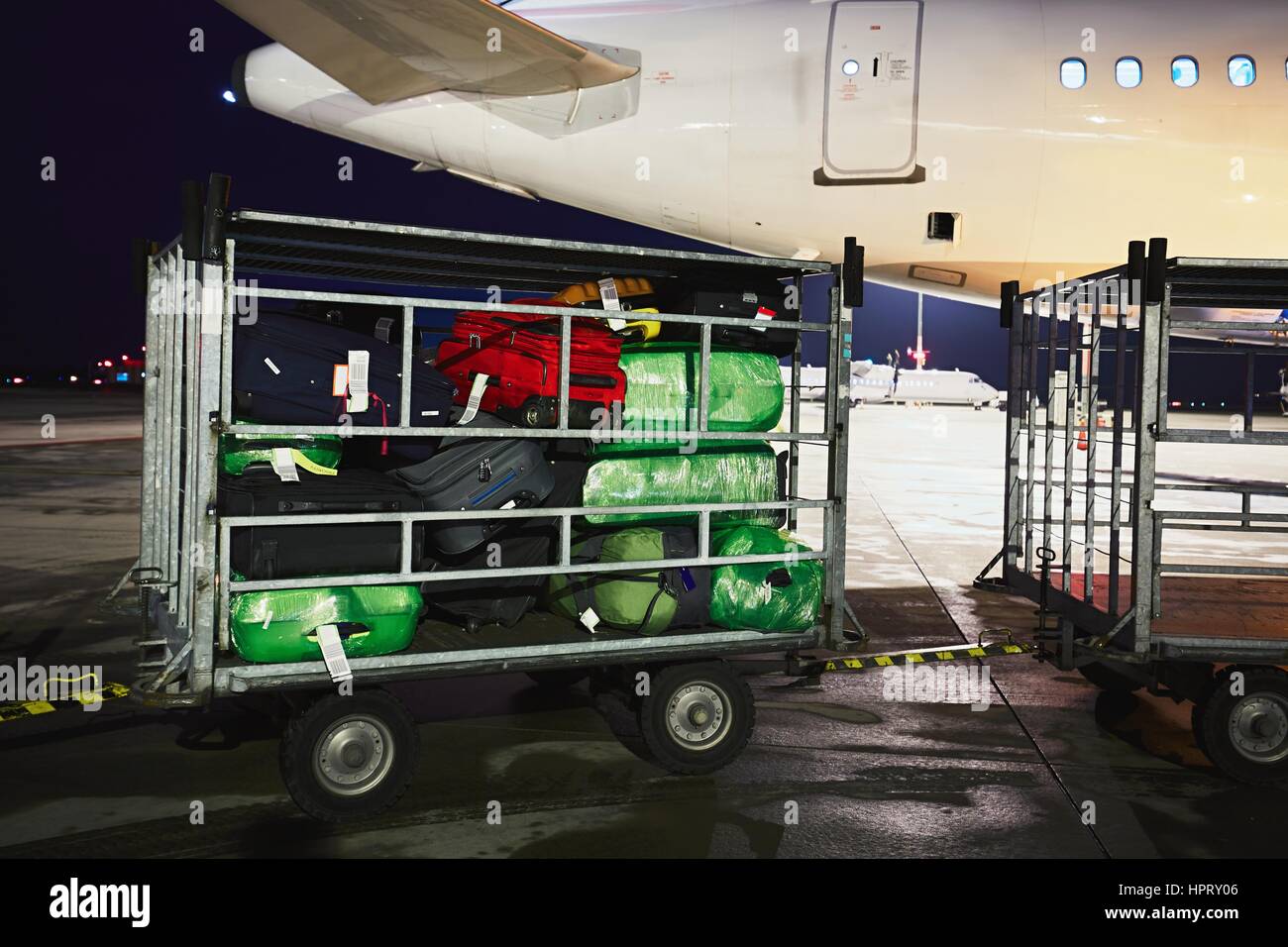 Cart with many baggage at the airport Stock Photo - Alamy