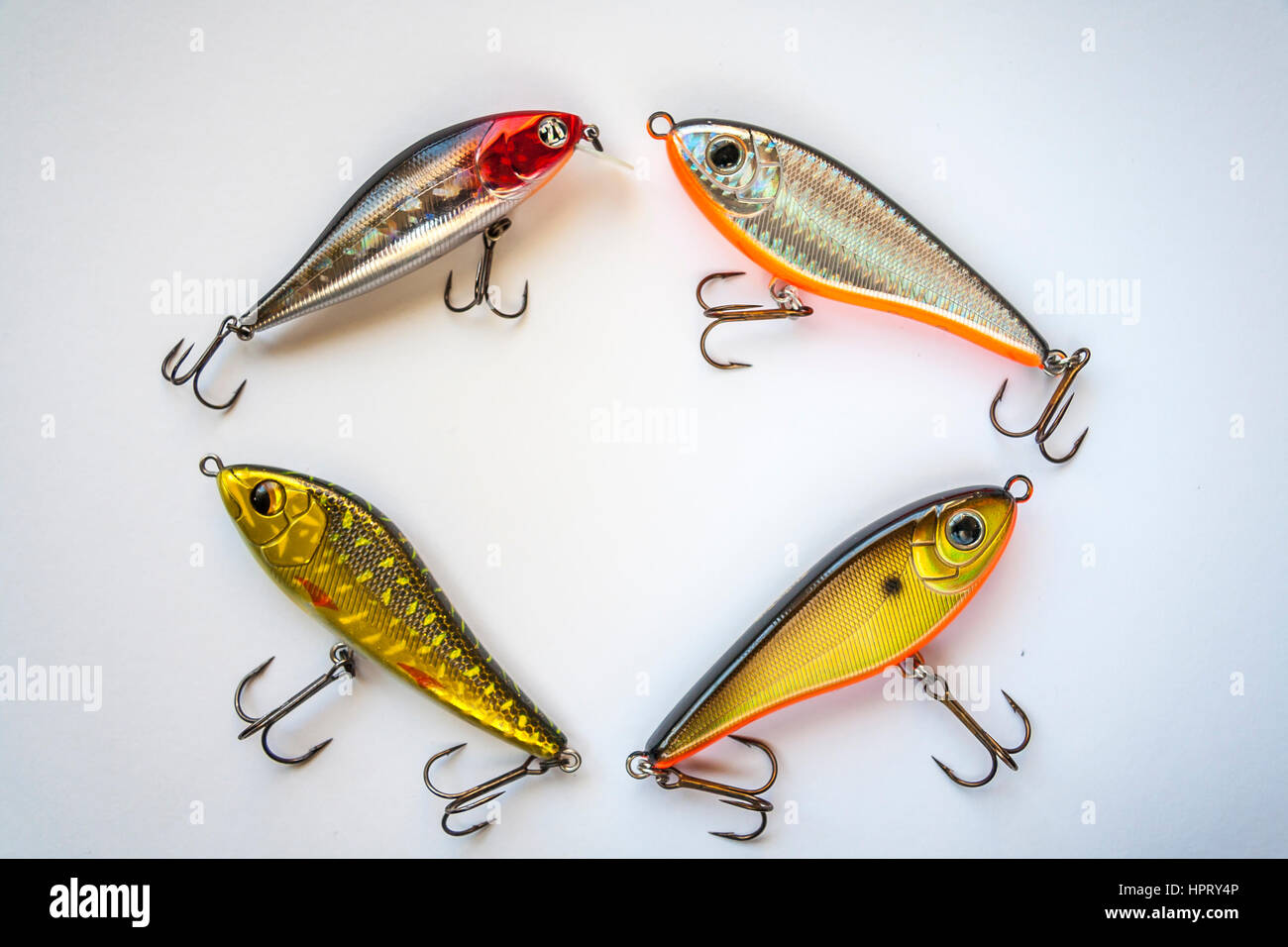 Fishing lures on white background Stock Photo - Alamy