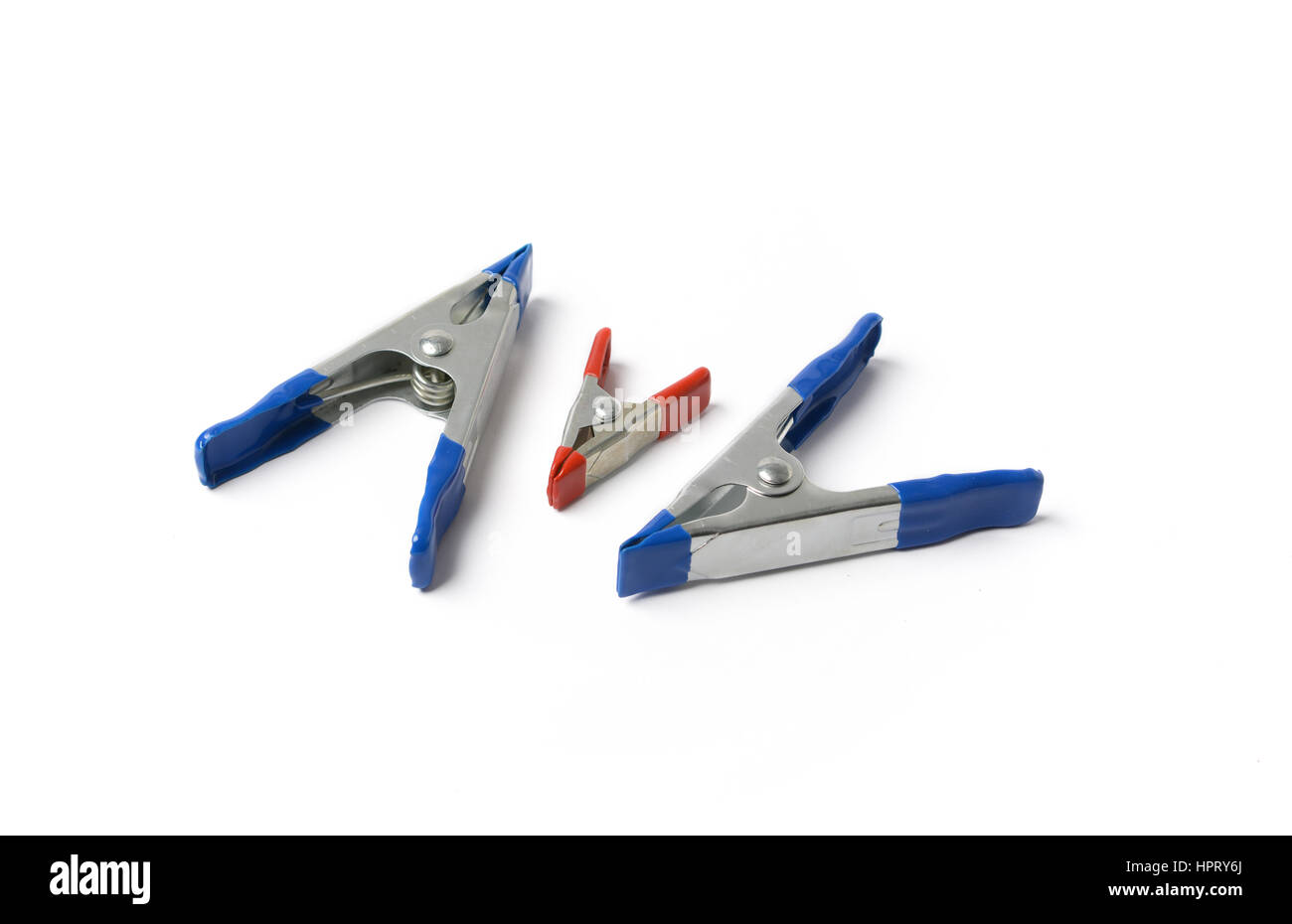 pile of metal pliers on white background - closeup Stock Photo - Alamy