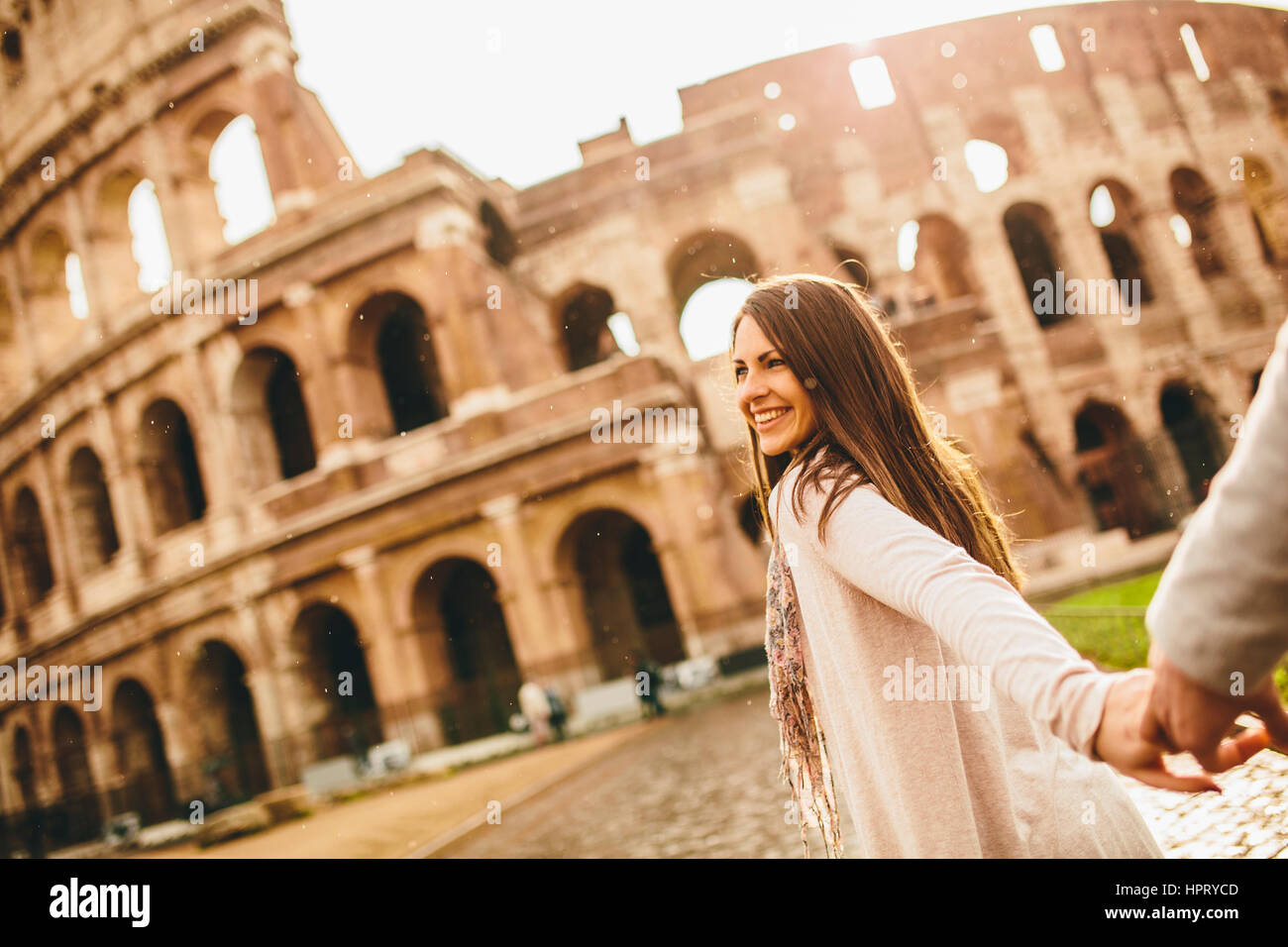 Woman rome colosseum holding hands hi-res stock photography and images ...
