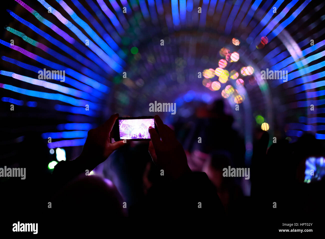 blur, camera, crowd, entertainment, evening, focus, fun, hands up ...