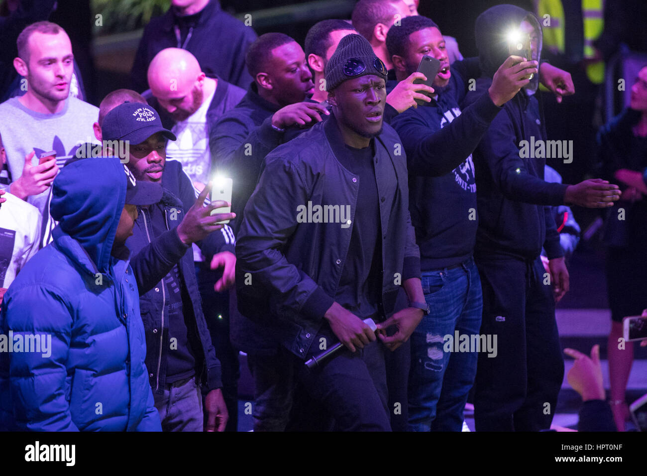 Grime MC Stormzy (centre) performs a surprise gig at Boxpark Croydon in ...