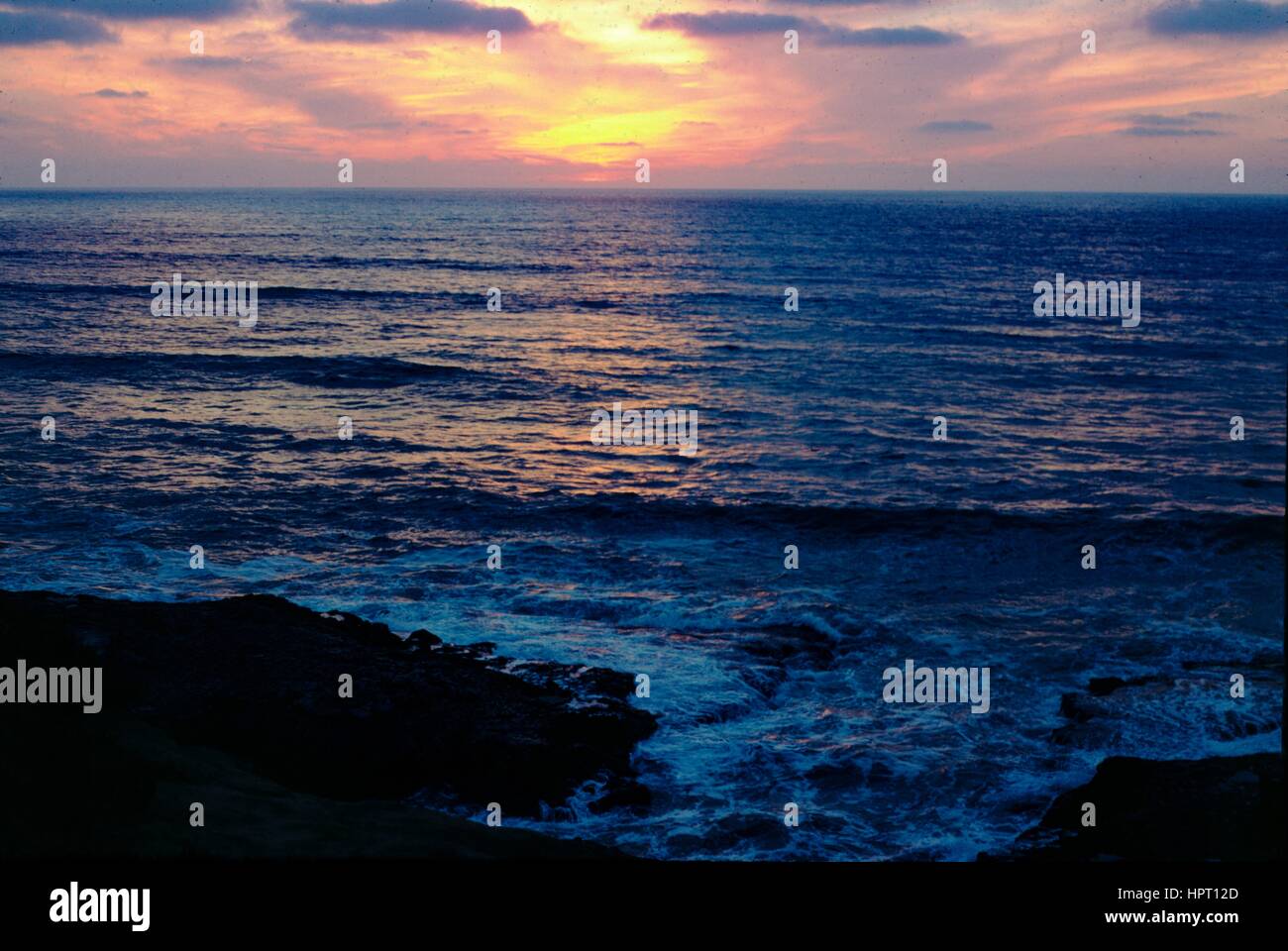 Blue and purple colors are visible during a sunset over the Pacific ...