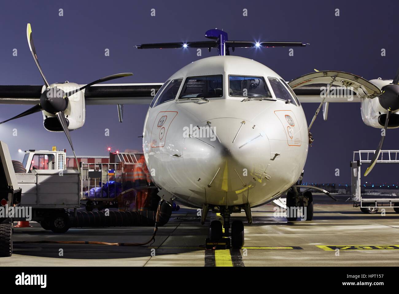 The ground crew is preparing the aircraft for take off Stock Photo - Alamy