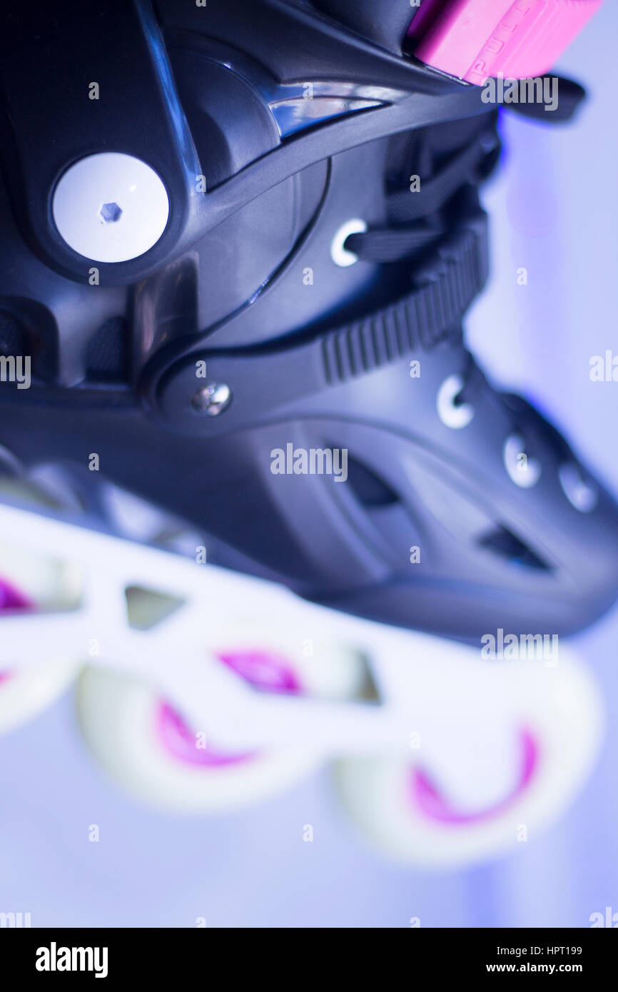 Freestyle inline skates boots and wheels in retail store shop window ...